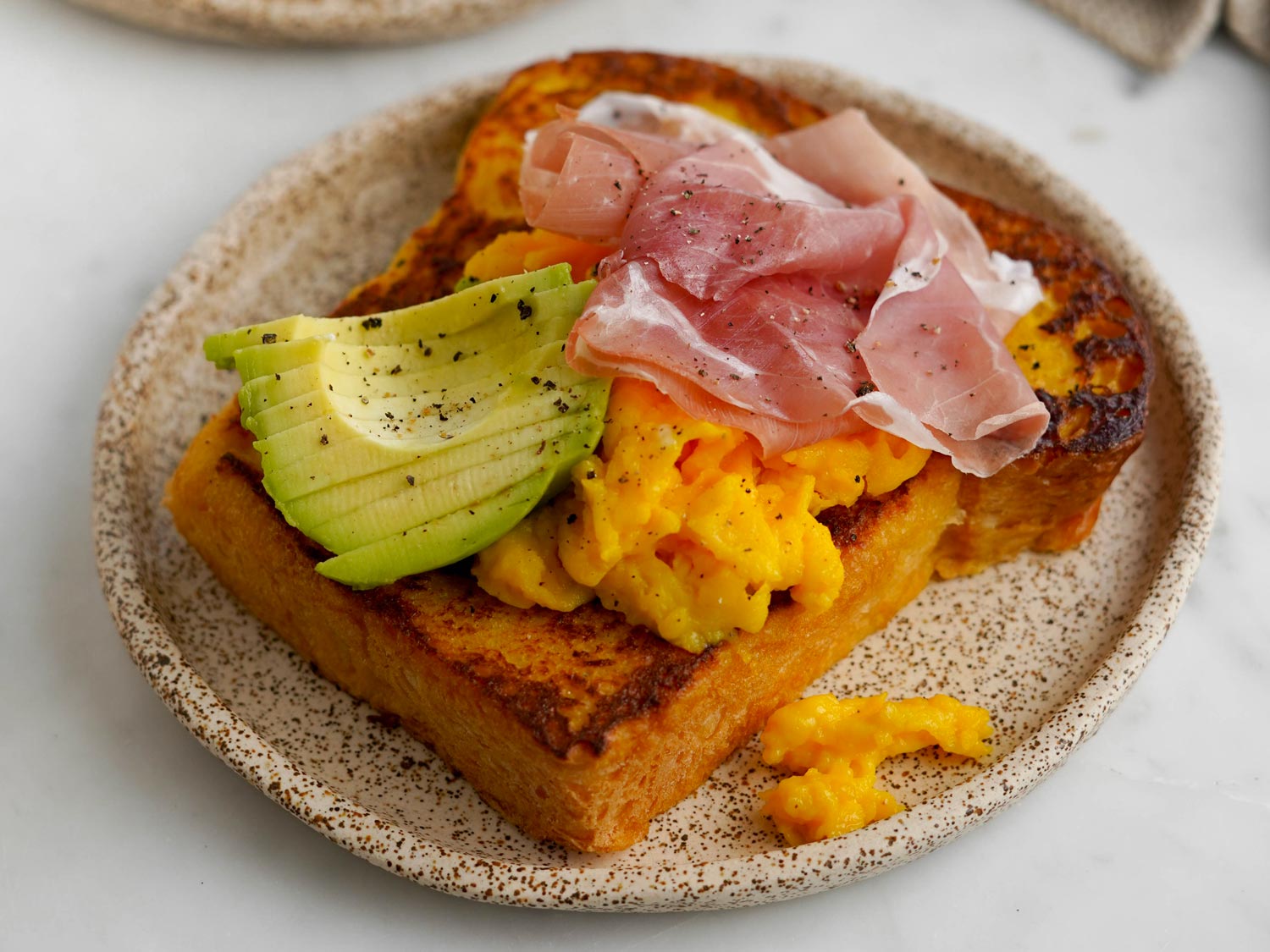 Savoury French toast with brioche, Prosciutto di San Daniele, scrambled ...